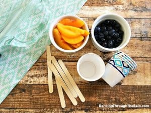 Blueberry Peach Popsicles (2 Ingredients!) - Dancing Through the Rain